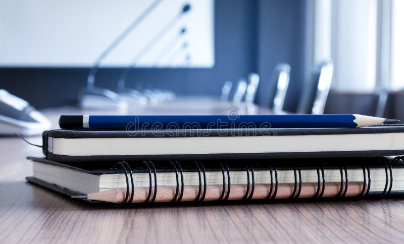 Close Up Pencil and Notebook on Table in Meeting Room Stock Photo ...