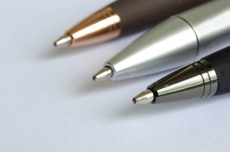 Close-up of Pens on White Notepad with Customizable Space for Text or ...