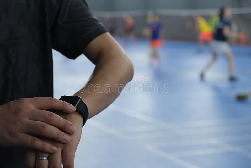 Close Up People Using Smart Watch in Indoor Stadium Stock Image - Image ...