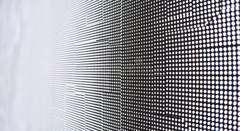 A Close-up of a Perforated Metal Sheet with a Grid of Evenly Spaced ...