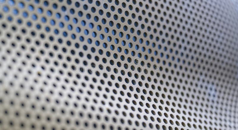 Close-Up of Perforated Metallic Surface Stock Photo - Image of carbon ...