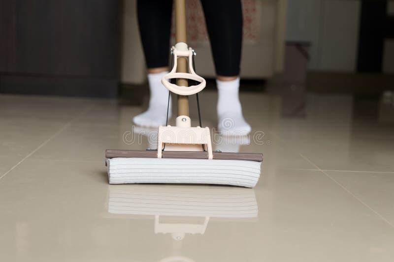 Close Up of Person Cleaning Floor with Mop at Home Stock Image - Image ...