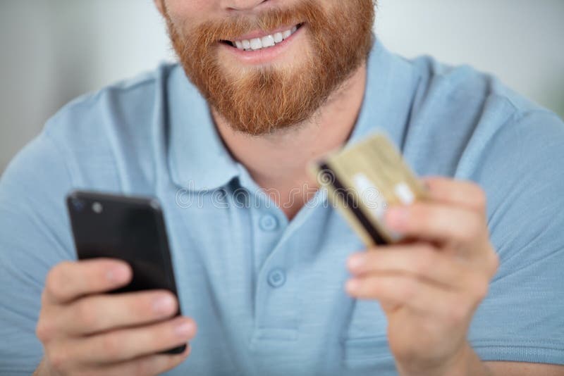 Close-up Person with Credit Card and Mobile Phone Stock Photo - Image ...