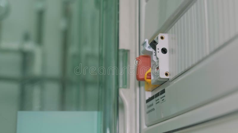 Person Flicking a Switch on and Off in the Electrical Cabinet. Stock ...