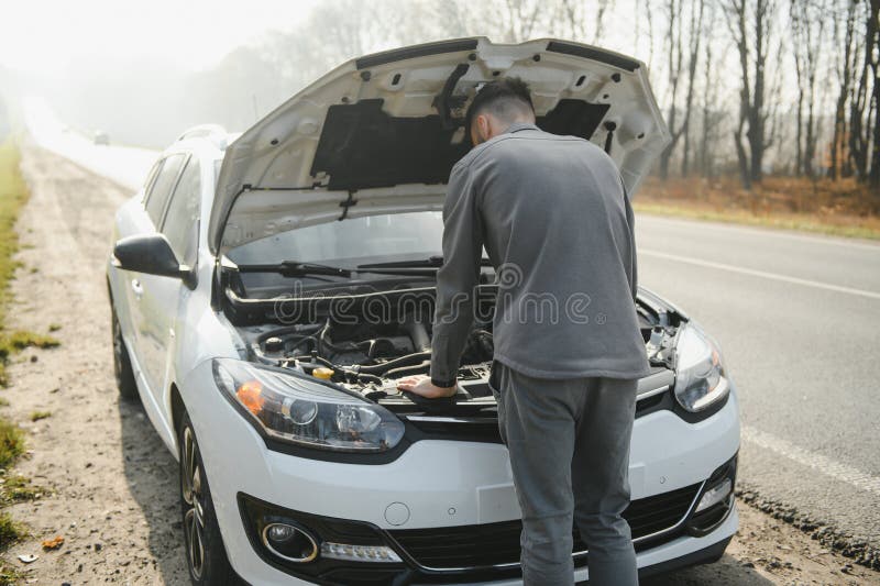 Close-up of a Person Hand Signing Contract with Keys on it Stock Photo ...