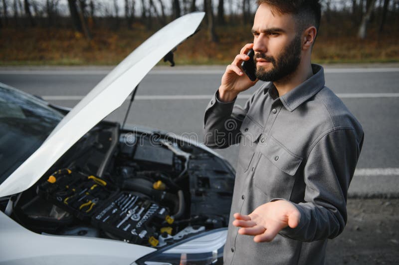 Close-up of a Person Hand Signing Contract with Keys on it Stock Image ...