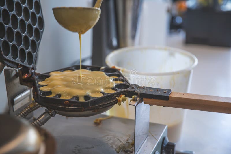 Close-up of a Person Making a Waffle in a Metal Waffle Maker Stock ...