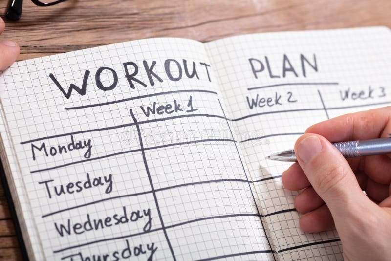 Person Writing Workout Plan in Notebook Stock Image - Image of office ...