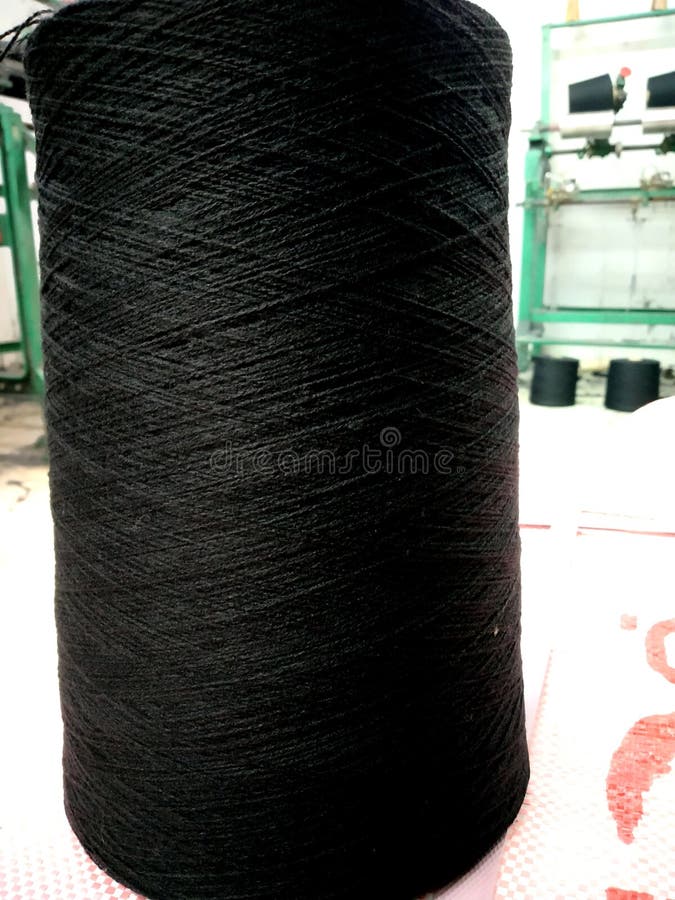 Close Up Photo of Black Threads in Cones Stock Photo - Image of ...