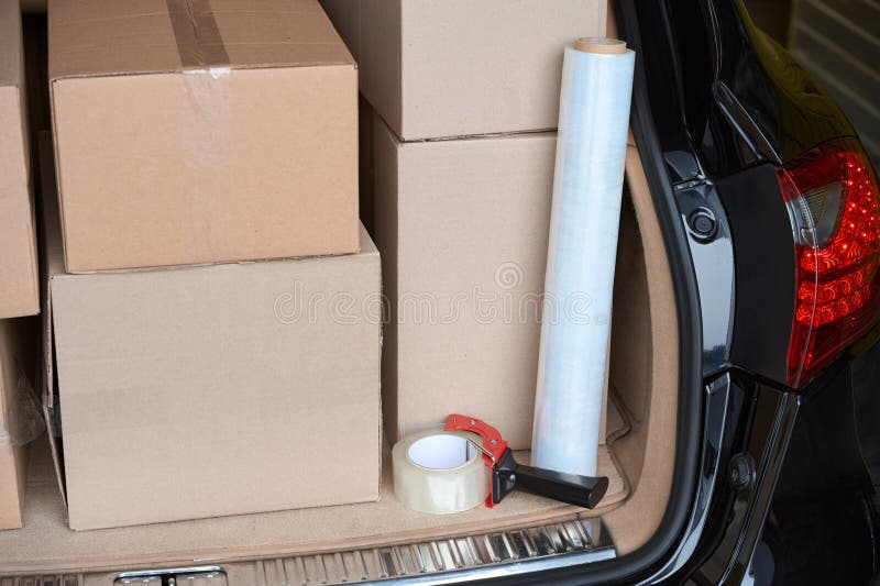 Close-up Photo of the Car Trunk with Boxes Inside Stock Photo - Image ...