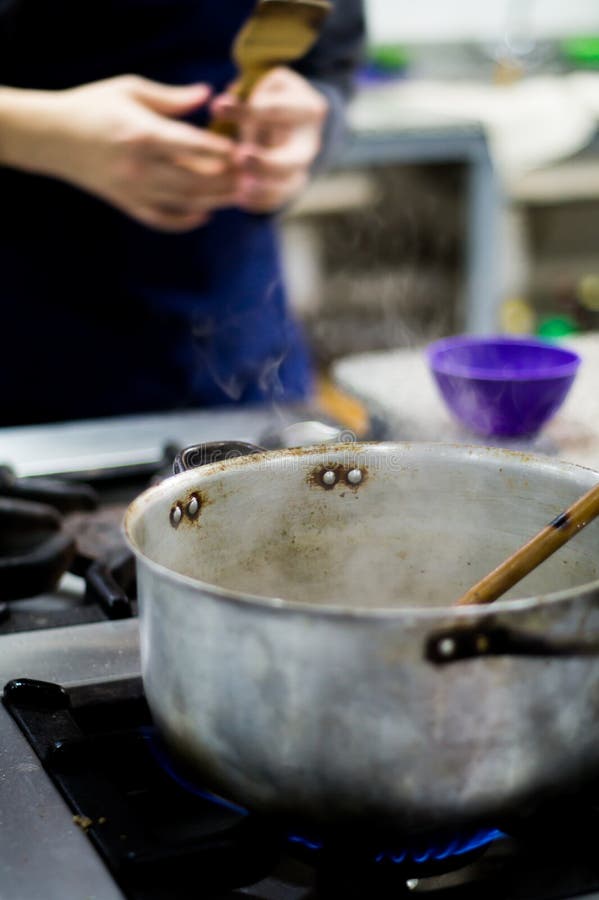 Close Up Photo of a Cooking Pot Over the Burner Stock Image - Image of ...
