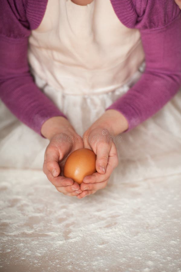 Close Up Photo of Egg in Little Hands Stock Photo - Image of ...