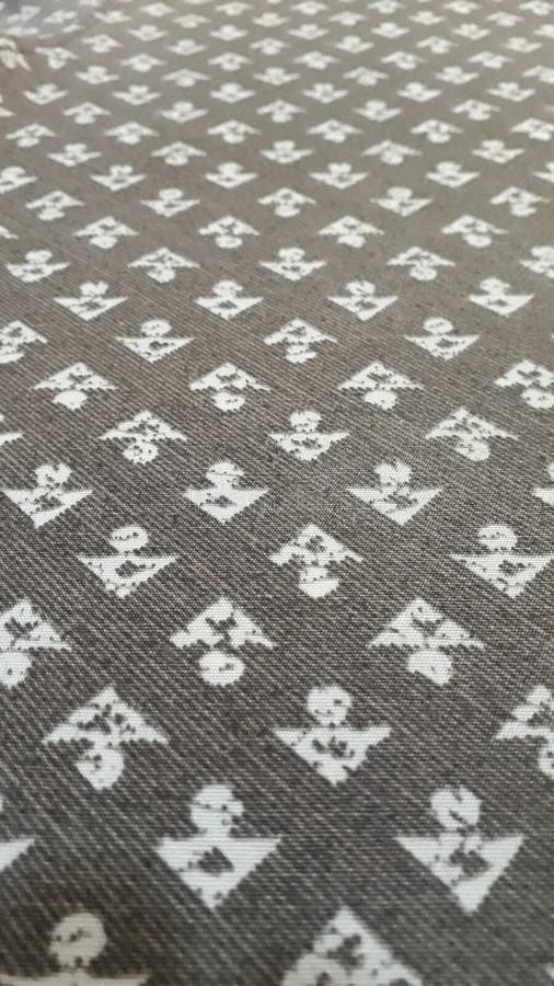 Close-up Photo of a Fabric Texture with a Repeating Pattern. Stock ...