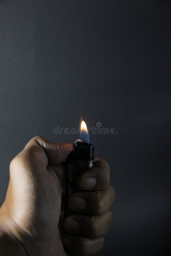 Lighting a Match Against a Black Background Stock Photo - Image of fire ...