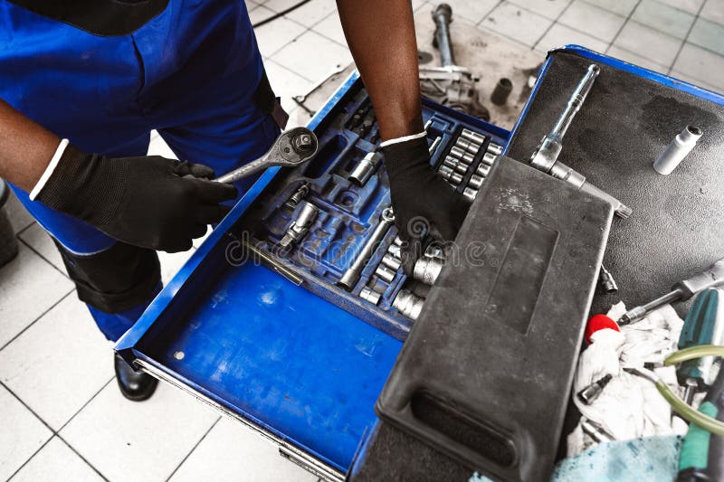 Close Up of Hands of Auto Mechanic Working in a Garage Stock Photo ...