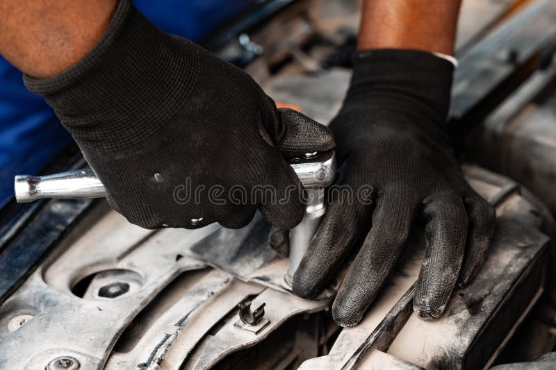 Close Up of Hands of Auto Mechanic Working in a Garage Stock Image ...