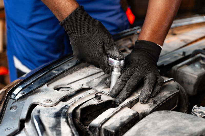 Close Up of Hands of Auto Mechanic Working in a Garage Stock Photo ...