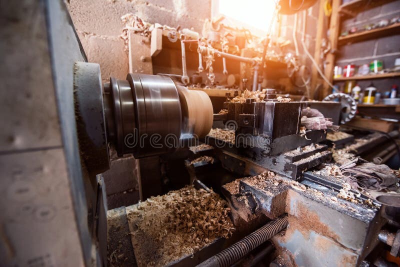 Close-up Photo of a Lathe Working on Wood. Mechanical Processing of ...