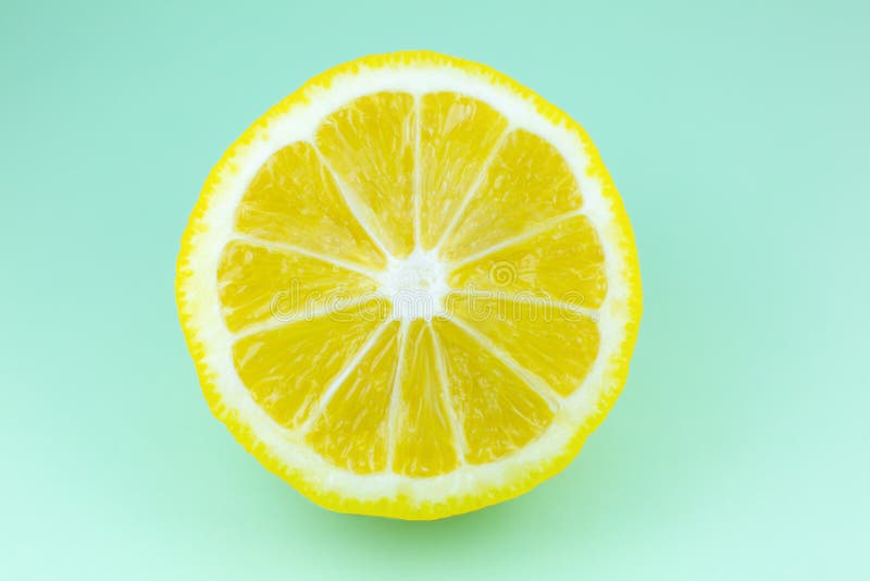Close Up Photo of Lemon Texture on the Blue Background. Fruit Cut in ...