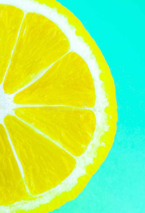 Close Up Photo of Lemon Texture on the Blue Background. Fruit Cut in ...