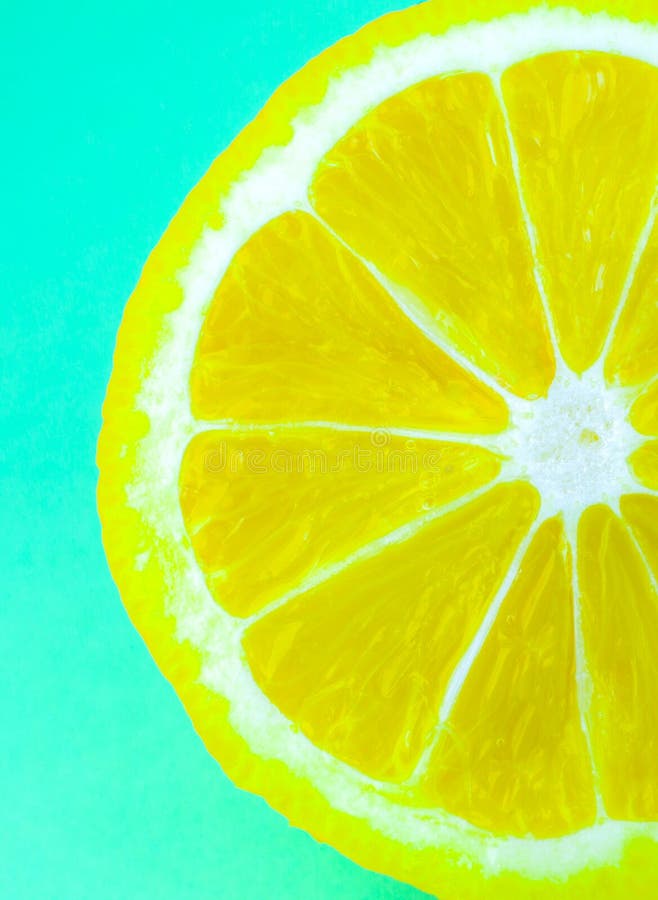 Close Up Photo of Lemon Texture on the Blue Background. Fruit Cut in ...