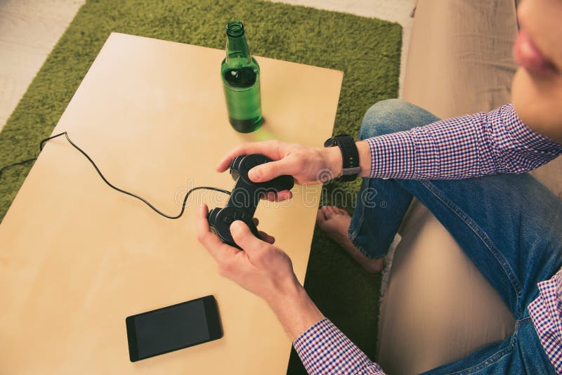 Close Up Photo of Man Playing Video Games with Beer Stock Image - Image ...