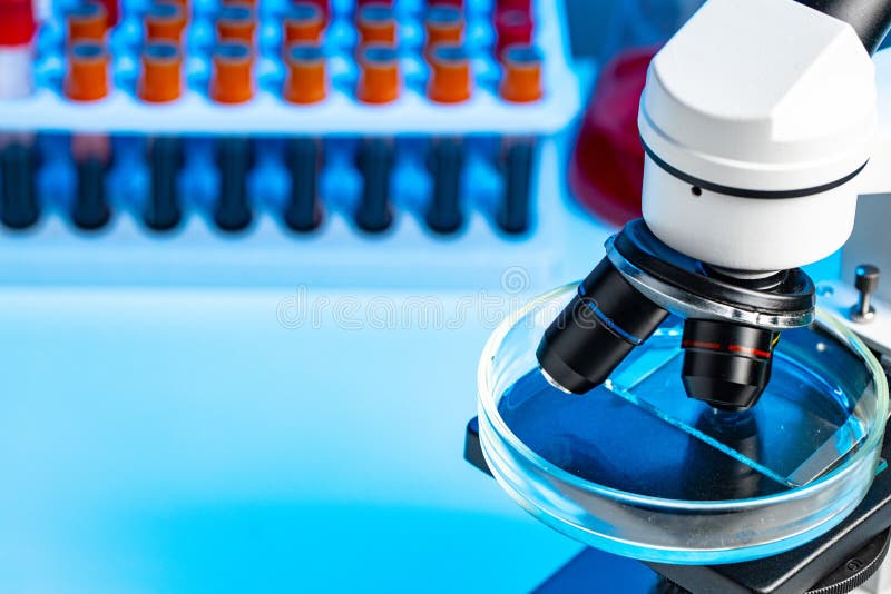 Close Up Photo of Microscope with Test Tubes with Blood Samples Stock ...