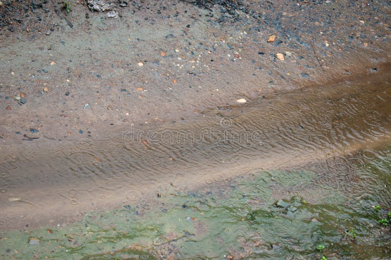Rainfall Patterns on Muddy Terrain Stock Photo - Image of surface ...