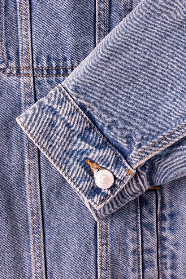 A Close-up Photo of One Element of a Common Denim Jacket. Stock Photo ...