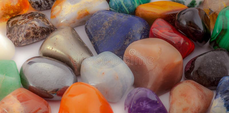 Close-up Photo of Polished Gemstones. High-angle View. Colorful ... Close-up Photo of Polished Gemstones. High-angle View. Colorful ...