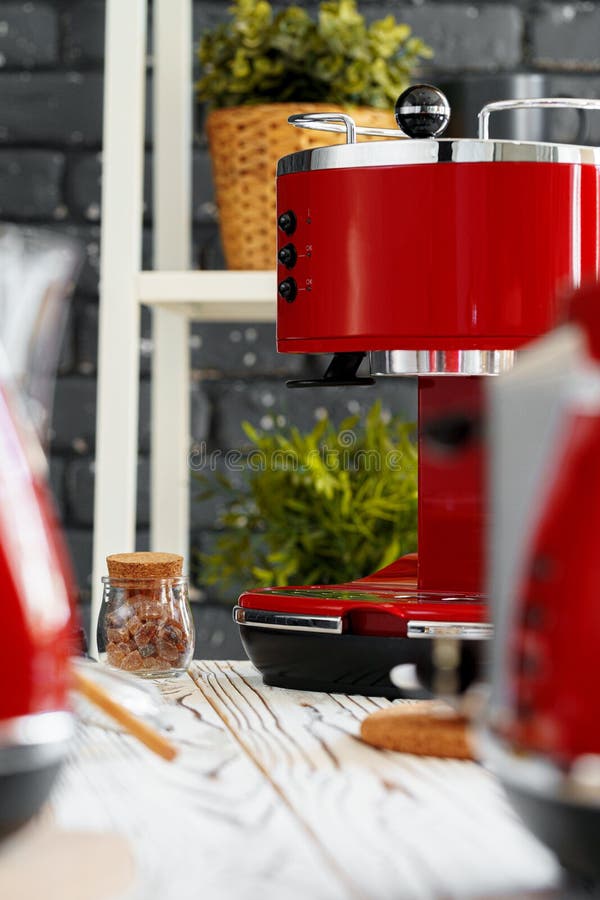 Close Up Photo of a Red Toaster on a Kitchen Table Stock Photo - Image ...