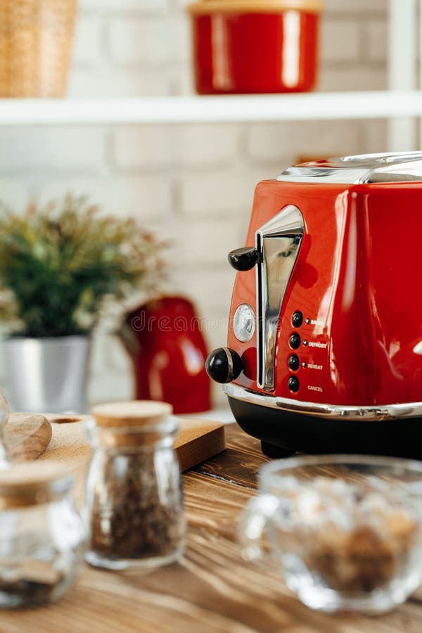 Close Up Photo of a Red Toaster on a Kitchen Table Stock Image - Image ...