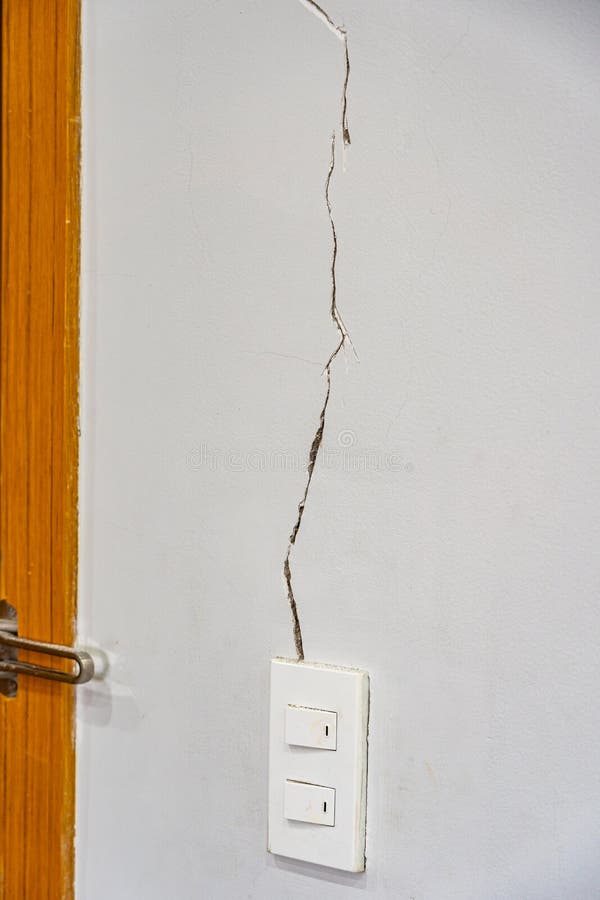 Severe Cracked Texture on the Wall Next To Light Switch Stock Photo ...
