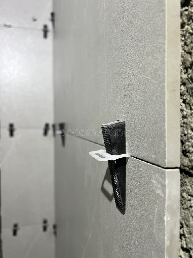 Close-up of Tile Installation on Wall Stock Image - Image of ...