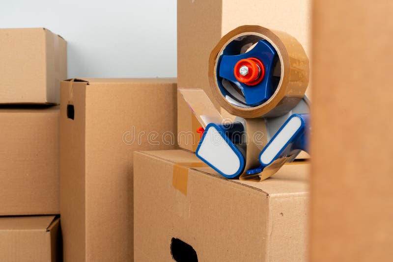 Stack of moving boxes stock photo. Image of space, brown - 56151062