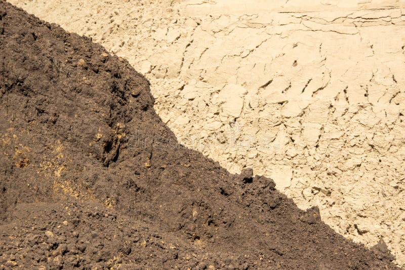 A Close-up Photo of the Surface of Two Different Types of Soil. One ...