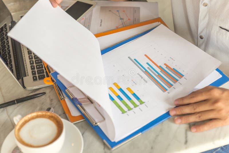 Close Up Photo of Young Businessman Checking Financial Document Stock ...