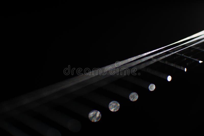 Close-up Photograph of Linear, Reflective Objects in a Black Background ...
