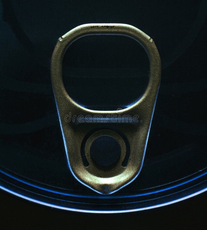 Close-up Photographed Lid of a Tin Can with a Key. View from Above ...