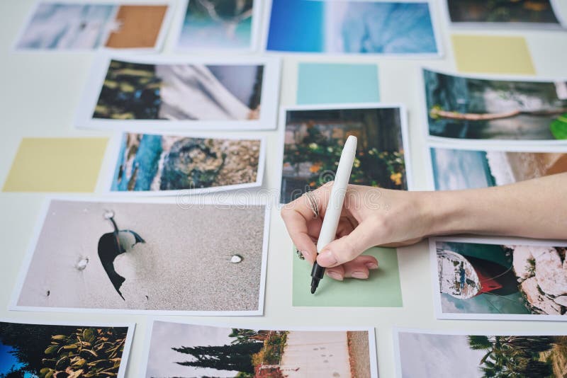 Photographer Making Collage from Photos Stock Photo - Image of ...