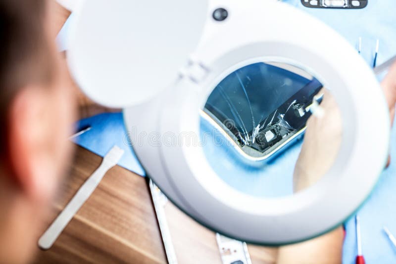 Close-up Photos Showing Process of Mobile Phone Repair. Stock Image ...