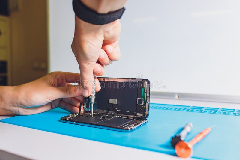 Close-up Photos Showing Process of Mobile Phone Repair. Stock Photo ...