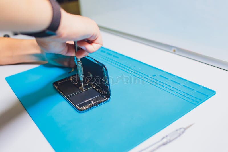 Close-up Photos Showing Process of Mobile Phone Repair. Stock Image ...