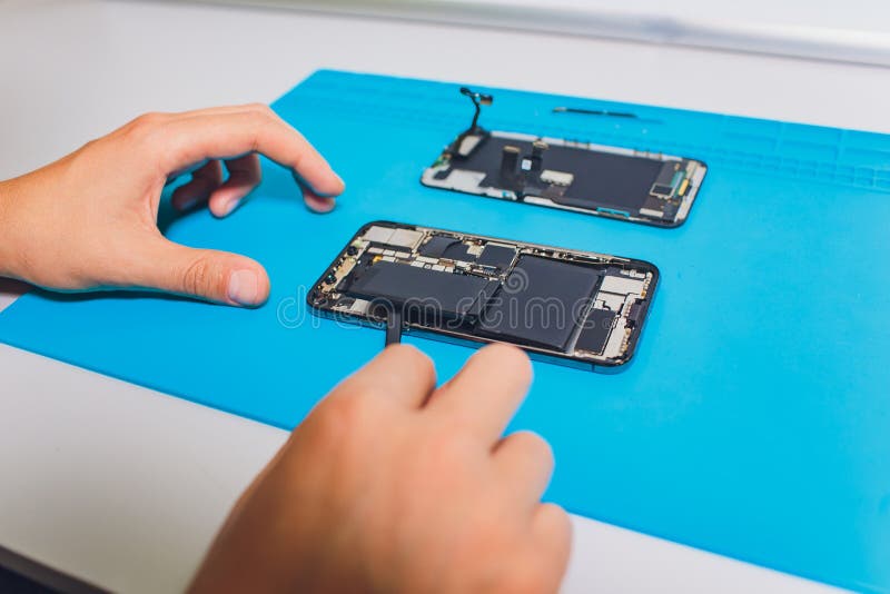 Close-up Photos Showing Process of Mobile Phone Repair. Stock Photo ...