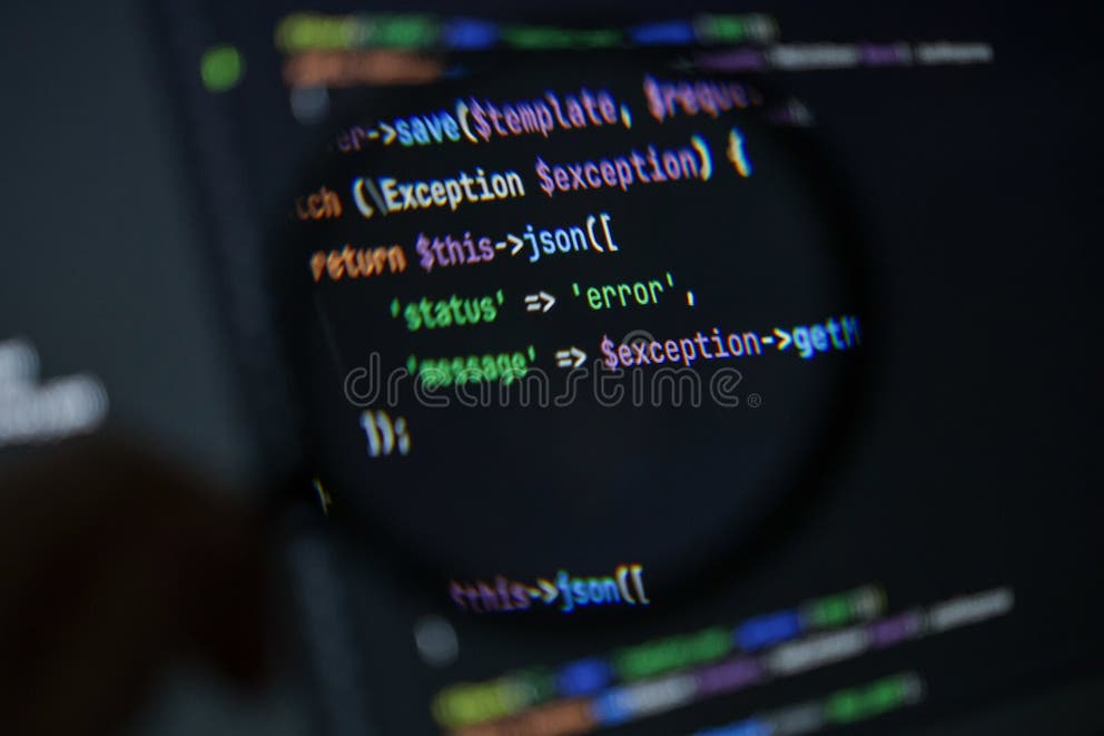 Close-up of Php Code Showing Error Handling with Json Response Under Magnifying Glass on Dark ...