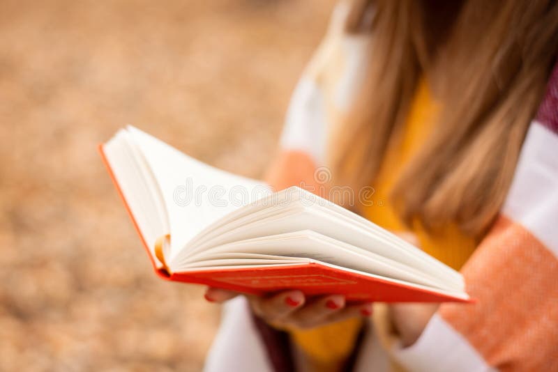 Close-up Picture of a Book in Hands of a Girl Stock Image - Image of ...