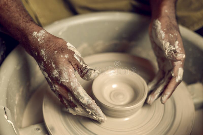Close Up Picture of Hands Working with Wet Clay and Molding Its Shape ...