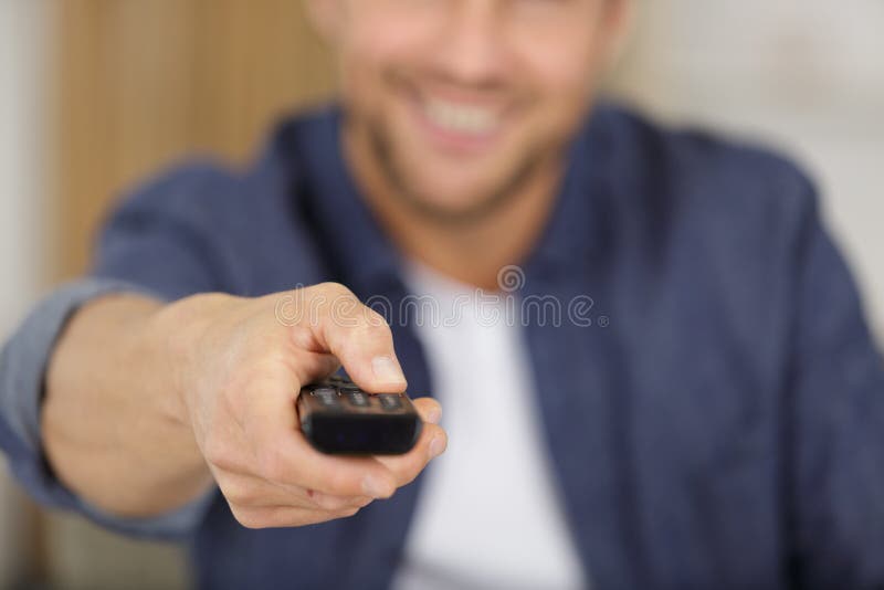 Close Up Picture Man Holding Remote Control Stock Image - Image of ...