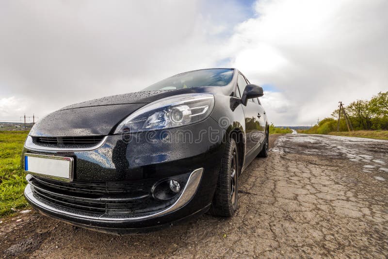 Close-up Picture of a Modern Car on a Bad Road Stock Photo - Image of ...