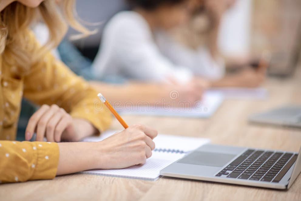 Close Up Picture of Students Making Notes during the Lecture Stock ...